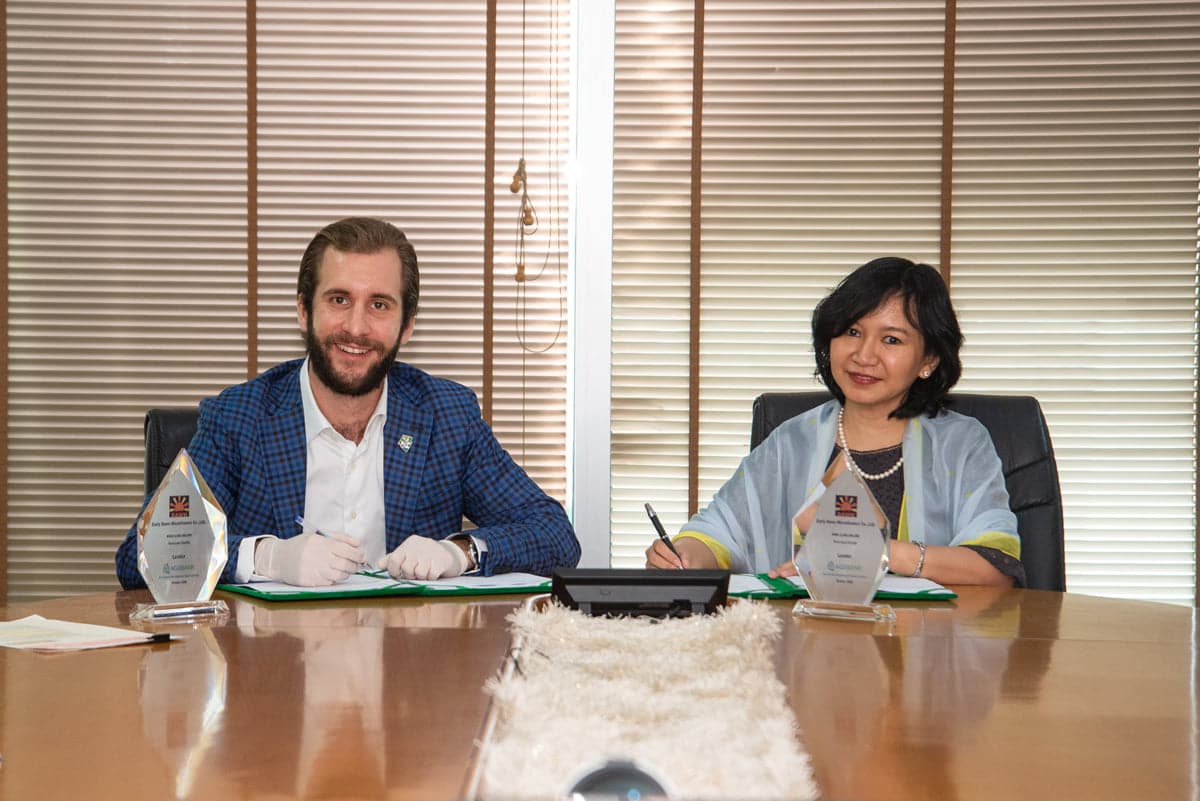 Financing agreement between DAWN and AGD Bank - Early Dawn Microfinance