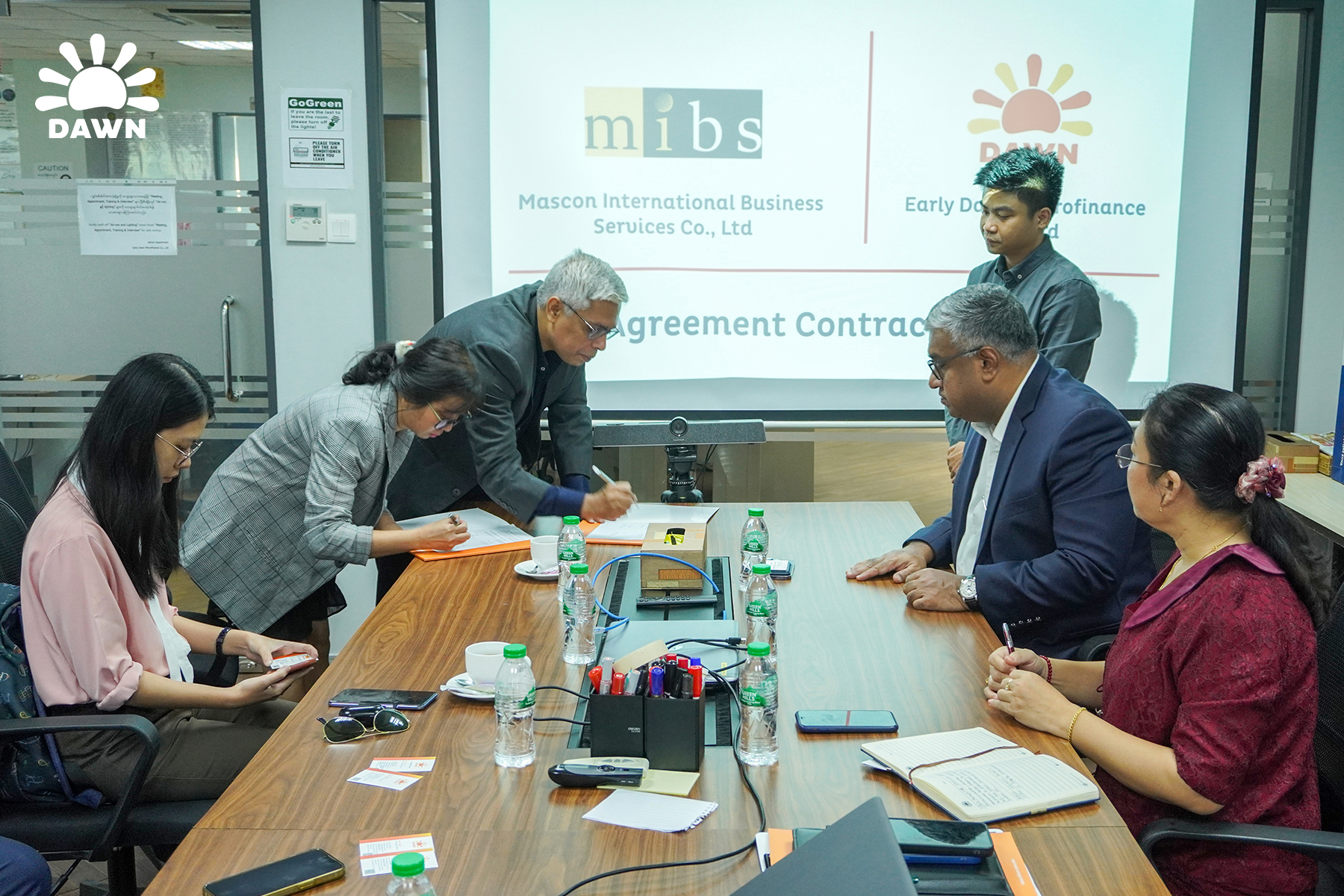 Contract Signing Ceremony for Call Center Service - Early Dawn Microfinance